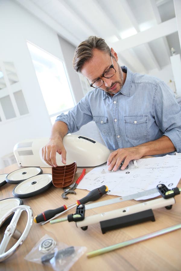 Man Asssembling Stock Photos - Free & Royalty-Free Stock Photos from ...