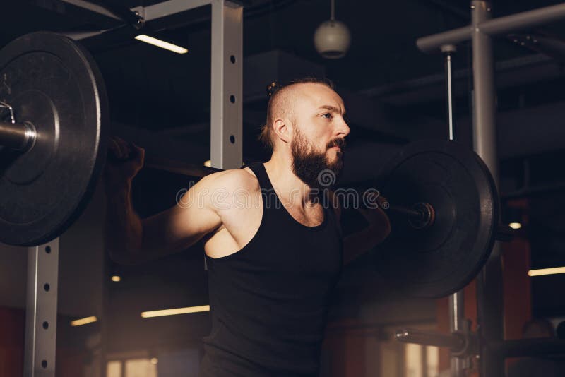 Boy of Athletic Build in Black Leather Jacket Stands on Ruined Brick ...