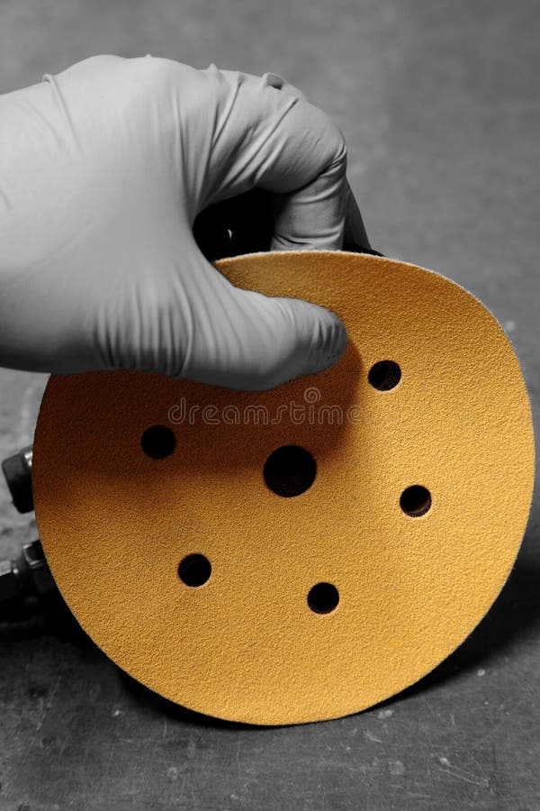 Man Attaching a Sanding Disc To an Orbital Sander Stock Image - Image ...