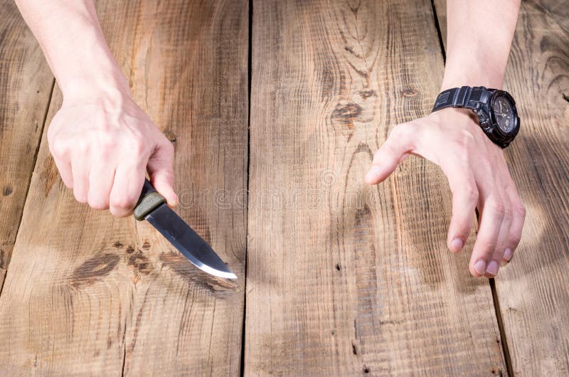 A Man Attacks with a Knife in His Hands. Capture and Hit Stock Image ...