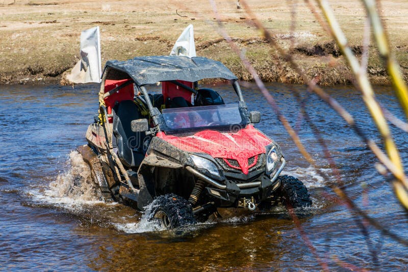 ATV splashing stock image. Image of people, active, blue - 1371293