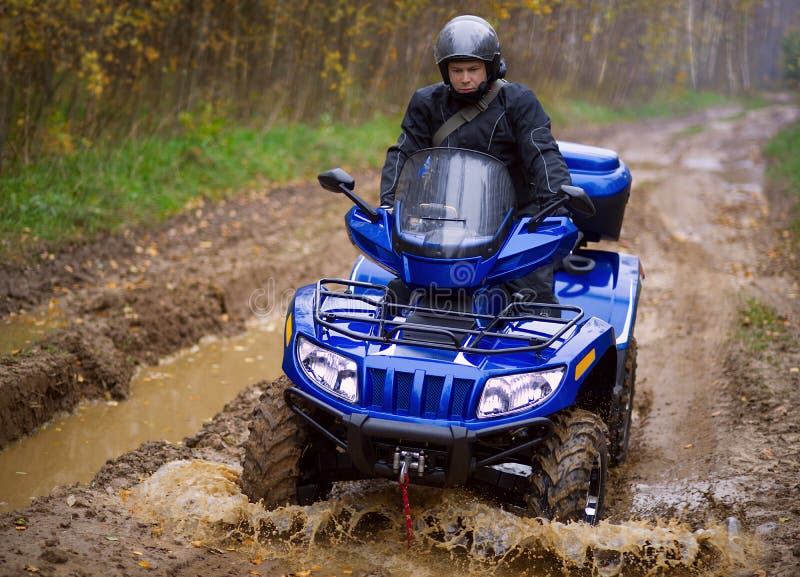 Man on ATV stock image. Image of bike, helmet, wheel - 32891935
