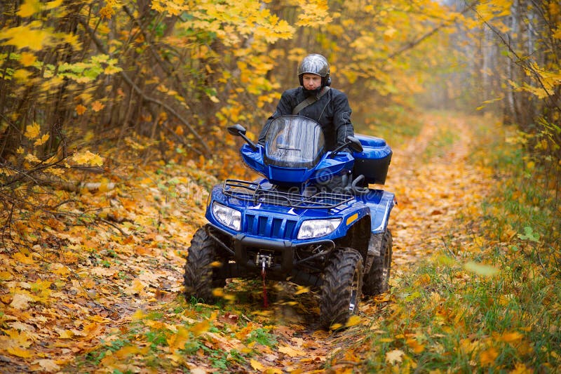 Man on ATV stock image. Image of bike, helmet, wheel - 32891935