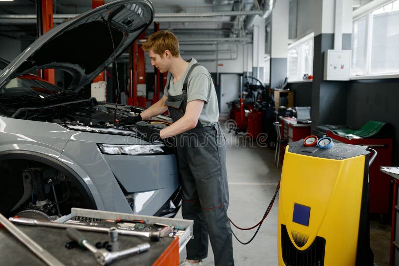 208 Car Ac Mechanic Stock Photos - Free & Royalty-Free Stock Photos ...