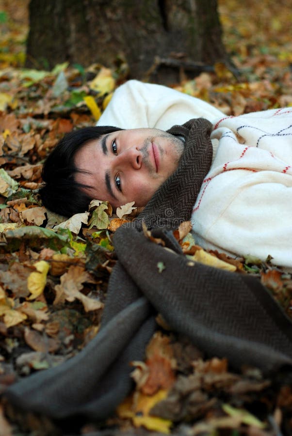Man on autumn leaves stock photo. Image of adult, portrait - 11471838