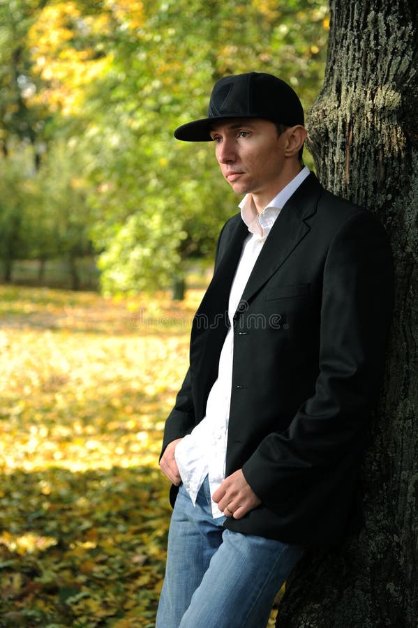 Man in autumn park stock image. Image of rest, serenity - 12025985