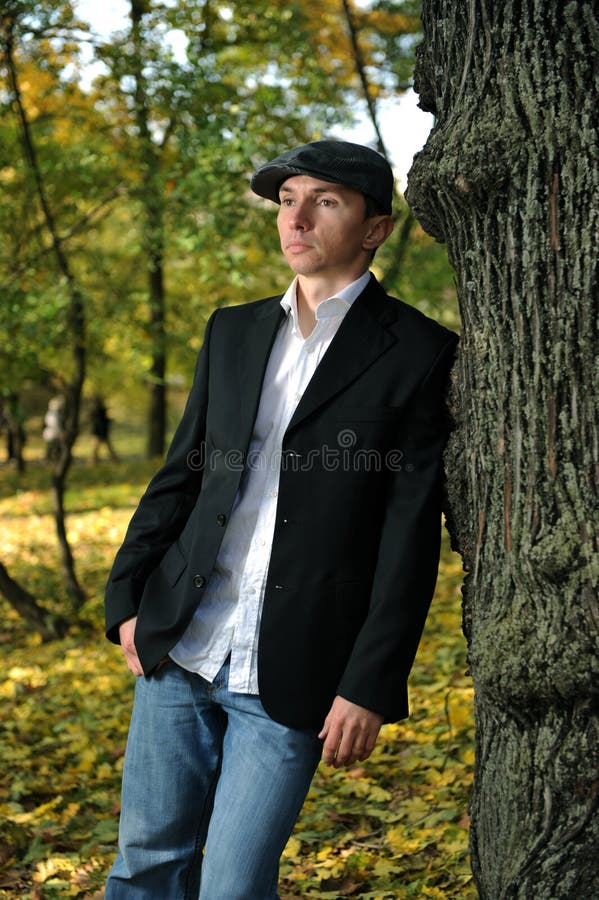 Man in autumn park stock image. Image of wondering, gaze - 12026015