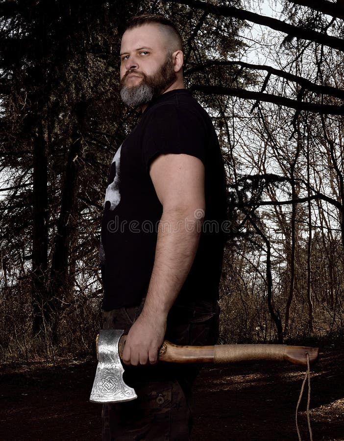 A Man with a Axe in a Forest Stock Photo - Image of person ...