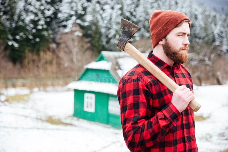 Handsome Pensive Man with Axe Standing in Mountain Winter Forest Stock ...