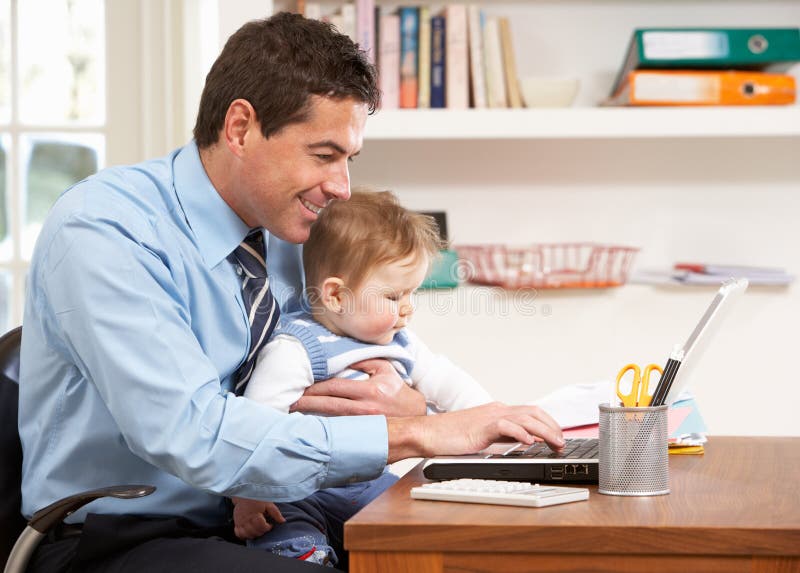 Man with Baby Working from Home Using Laptop Stock Image - Image of ...
