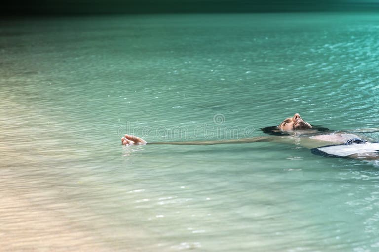 151 Man Floating Back Ocean Stock Photos - Free & Royalty-Free Stock ...