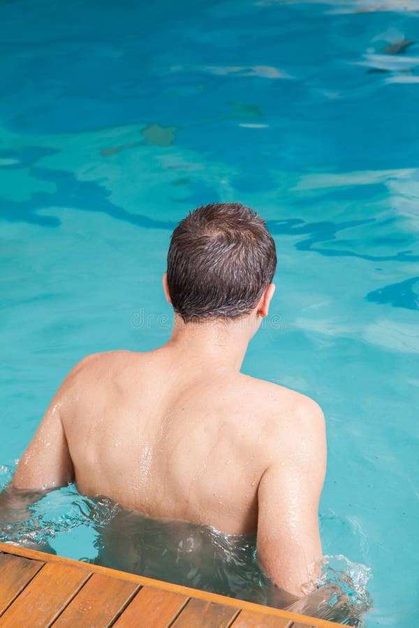Man back swimming stock photo. Image of single, edge - 65087974