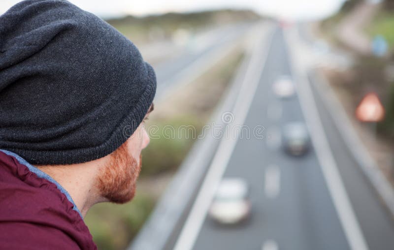 Man Back at the Top of a Bridge Over a Highway Stock Photo - Image of ...