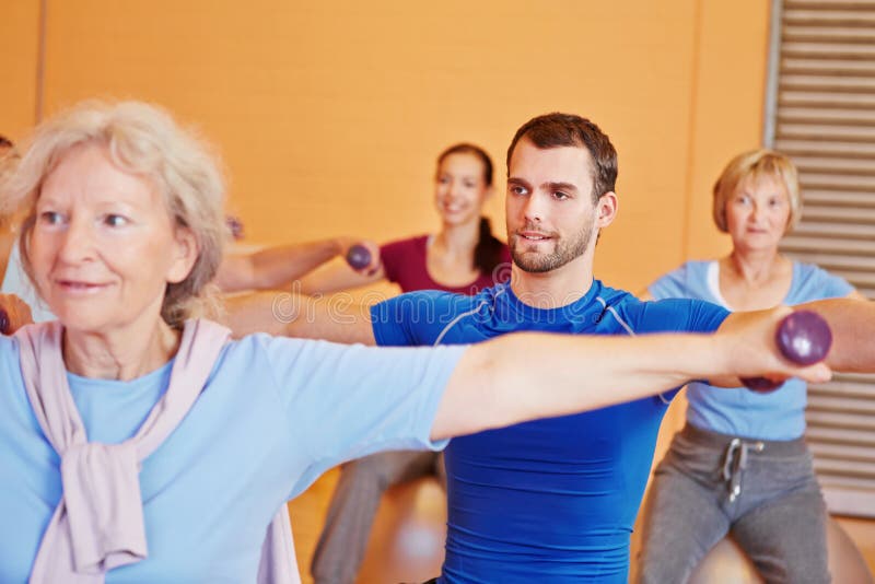 Man in Back Training Class in Gym Stock Image - Image of ball, citizen ...