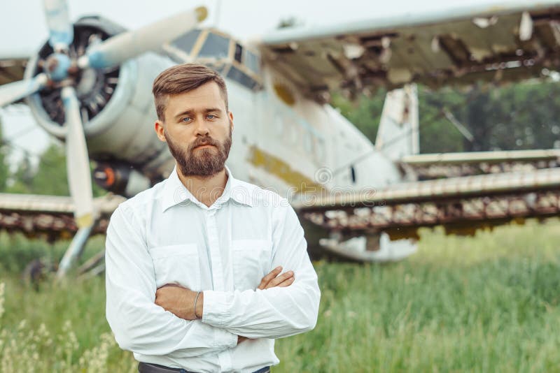 A Man on the Background of an Old Plane Stock Image - Image of plane ...