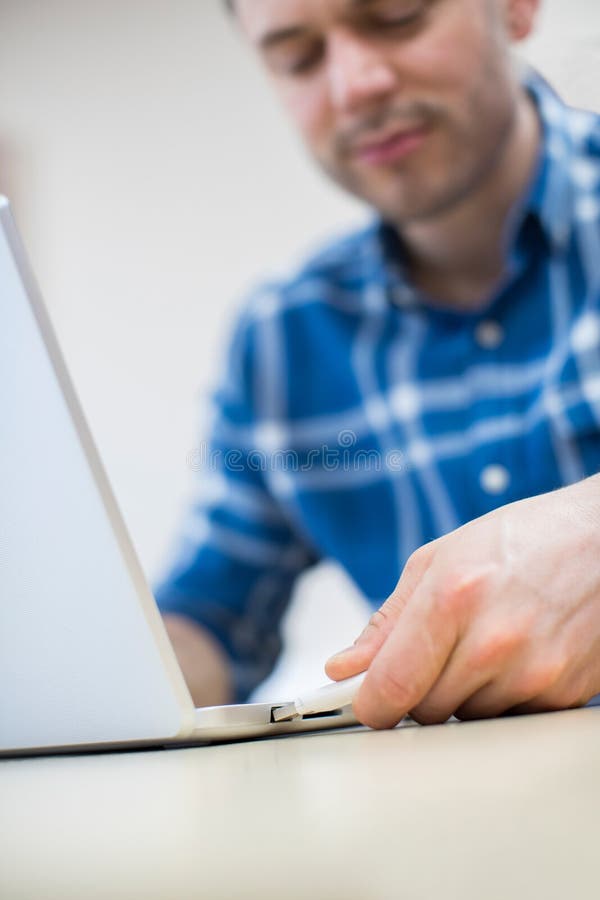 Man Backing Up Computer Data Onto Memory Stick Stock Photo - Image of ...