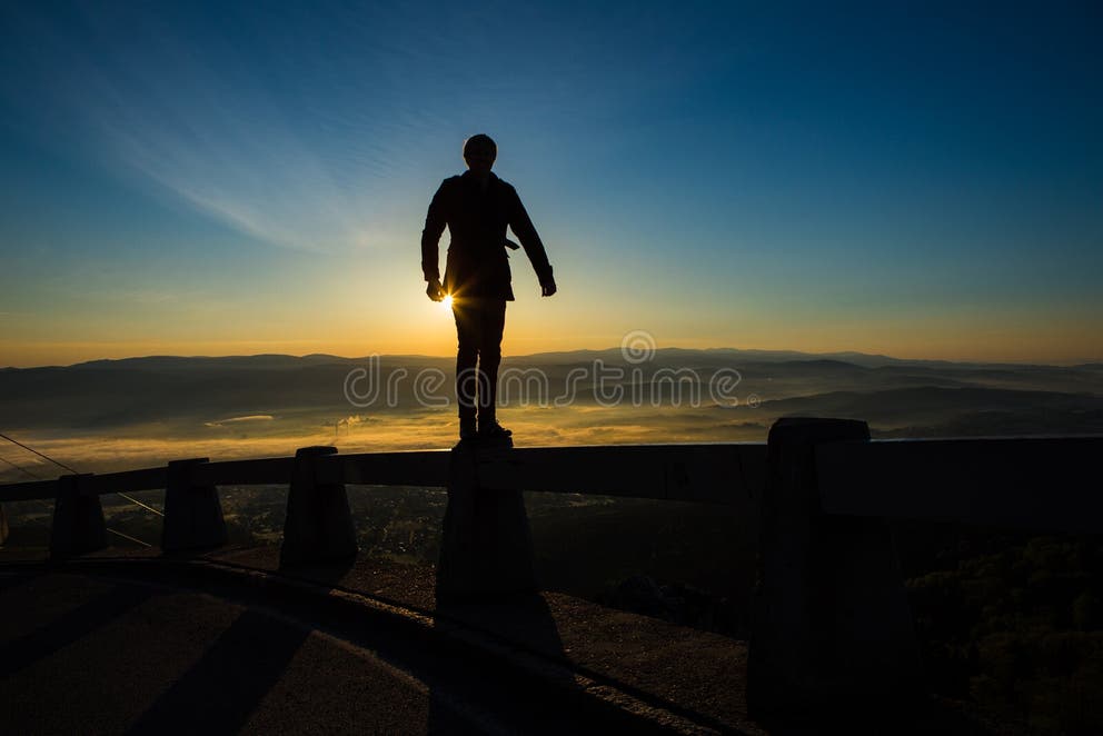 Man backlit at sunset stock photo. Image of standing - 40393790