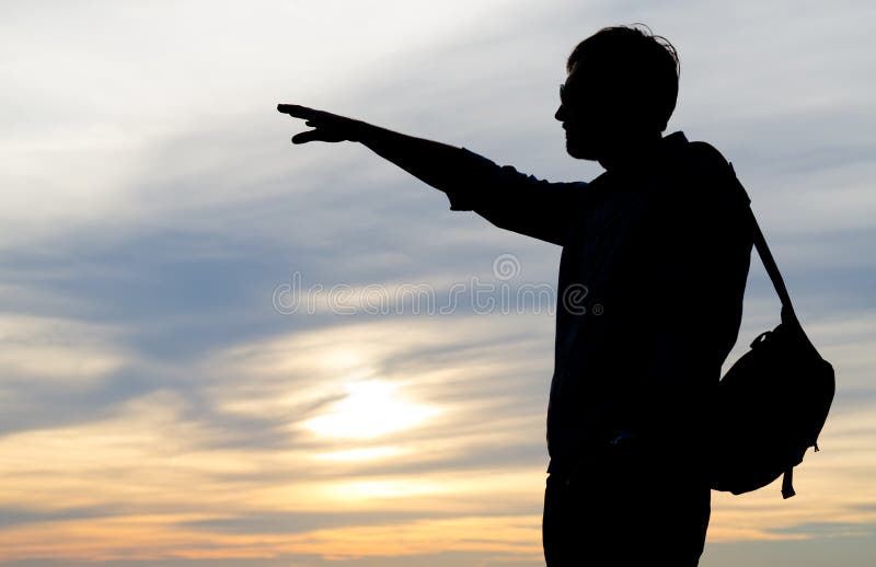 Man with a Backpack Pointing Stock Photo - Image of lifestyle ...