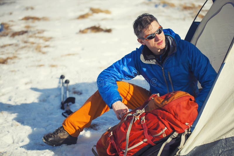 Man with a Backpack Sitting Near the Tent. Stock Image - Image of ...