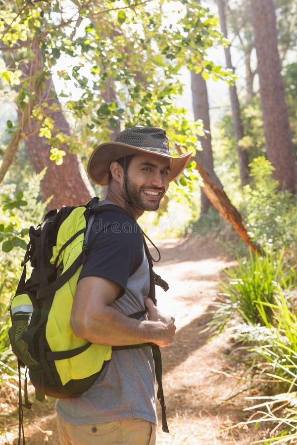Man with Backpack Walking on the Path in Forest Stock Photo - Image of ...