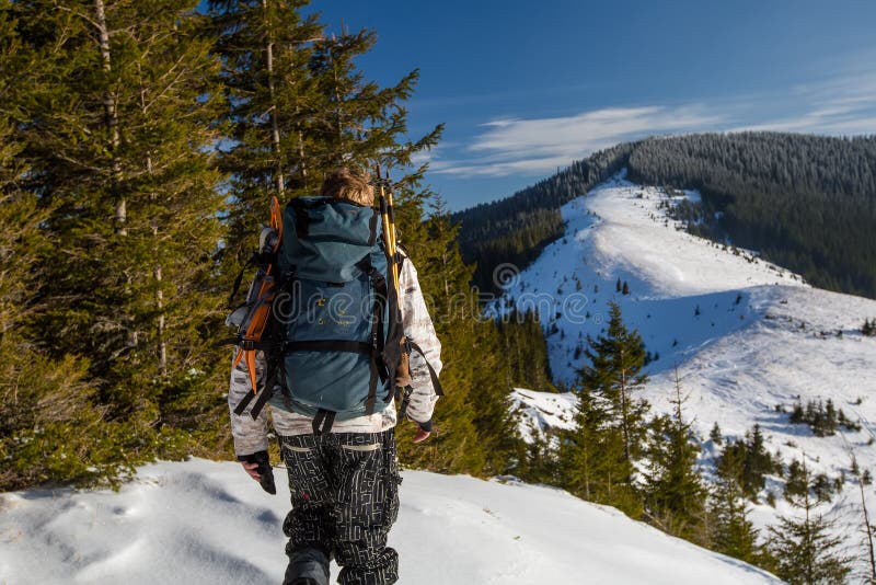 Man is Backpacking in Winter Mountains Stock Photo - Image of mountains ...