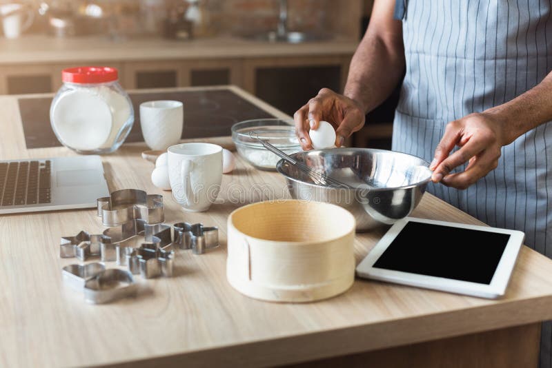 Man Baking Pie with Recipe on Digital Tablet Stock Photo - Image of ...