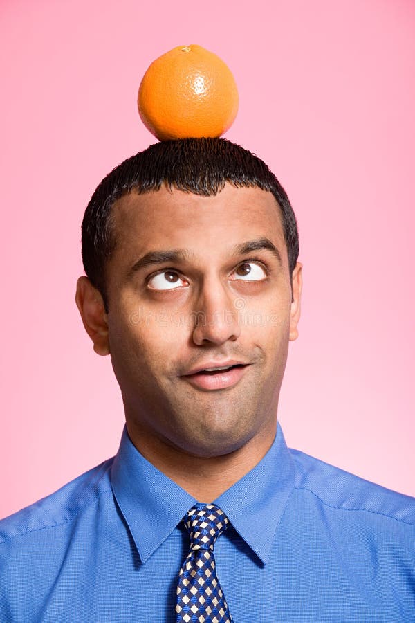 Man Balancing Orange Head Stock Photos - Free & Royalty-Free Stock ...