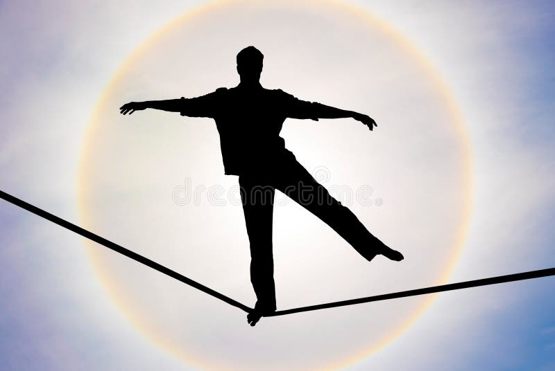 Man Balancing on the Rope Challenge and Risk Taking Concept Stock Photo ...