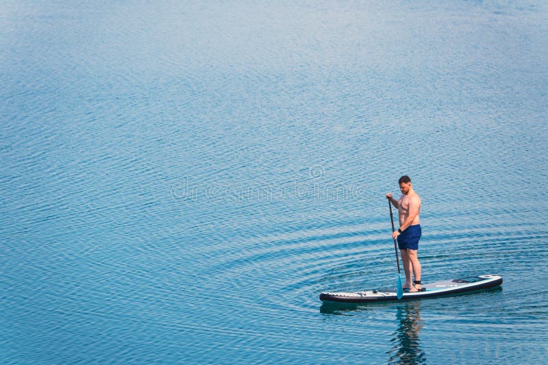 Man Balancing Supboard Paddling Stock Photos - Free & Royalty-Free ...