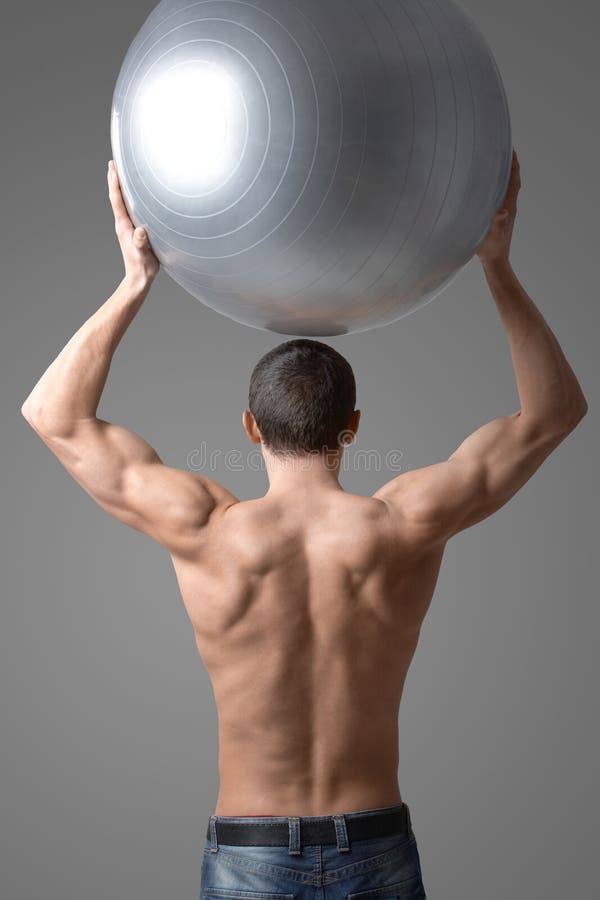 Man with ball stock photo. Image of muscularity, adult - 21768242