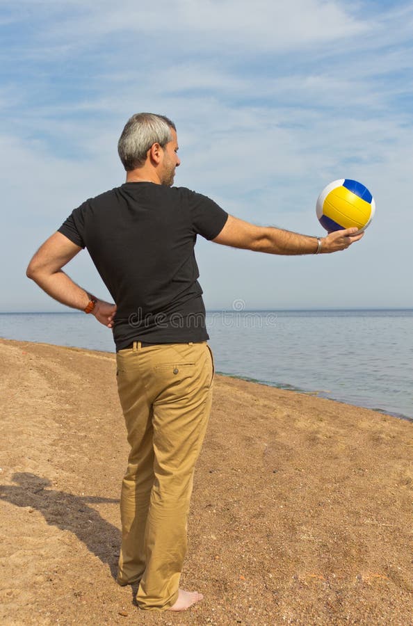 The man with the ball stock photo. Image of sand, sports - 25632654