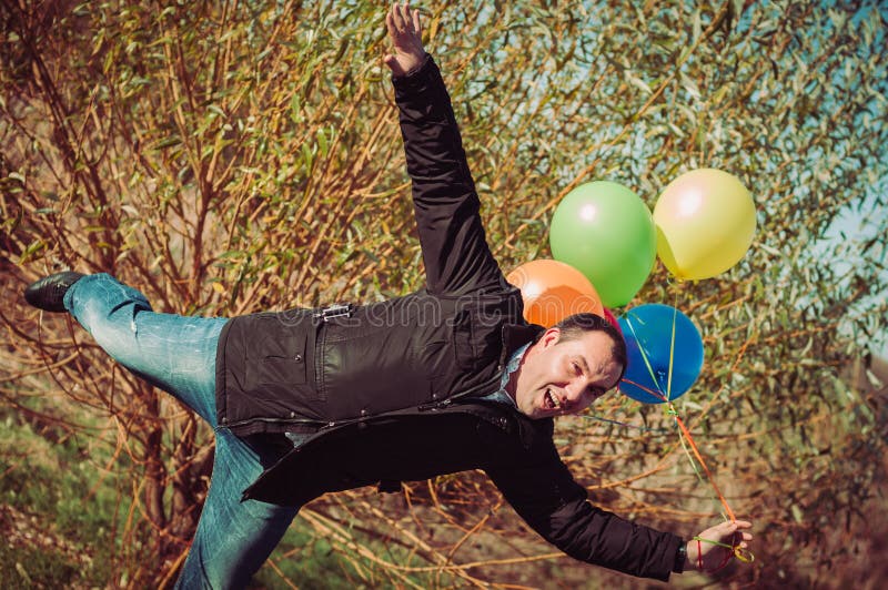 Man with balloons stock photo. Image of happiness, love - 29331056
