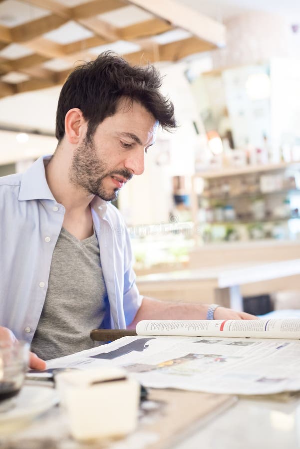 Man at the Bar Reading Newspaper Stock Photo - Image of life, years ...