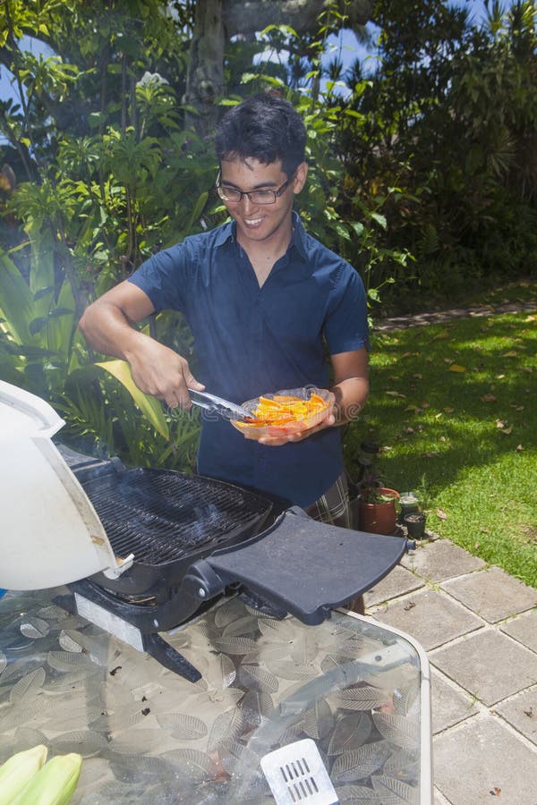 1,312 Man Barbecuing Stock Photos - Free & Royalty-Free Stock Photos ...