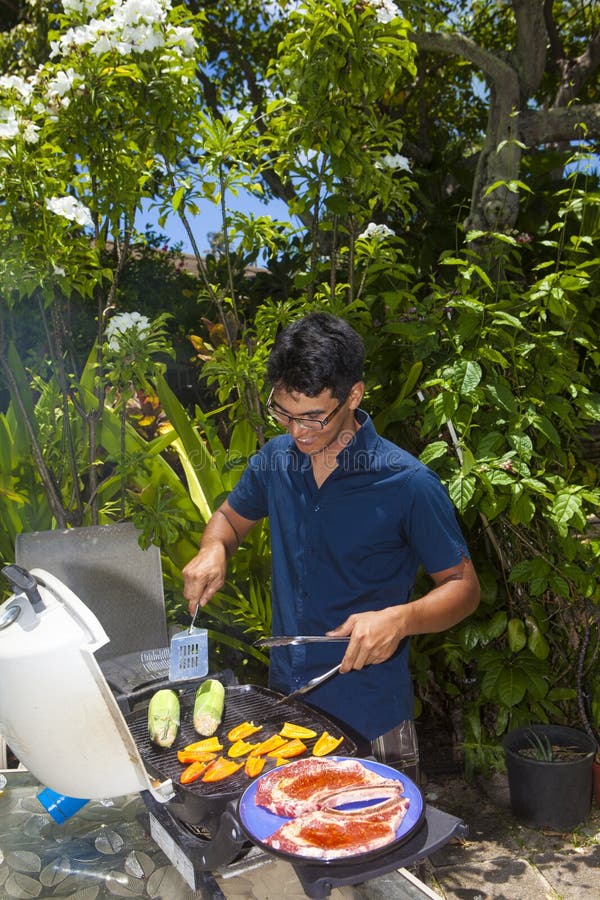 Man Barbecuing in His Garden Stock Photo - Image of asian, hawaii: 57595430