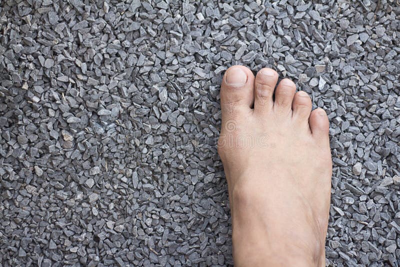 Man bare feet in rocks stock image. Image of rocks, carefree - 83393741