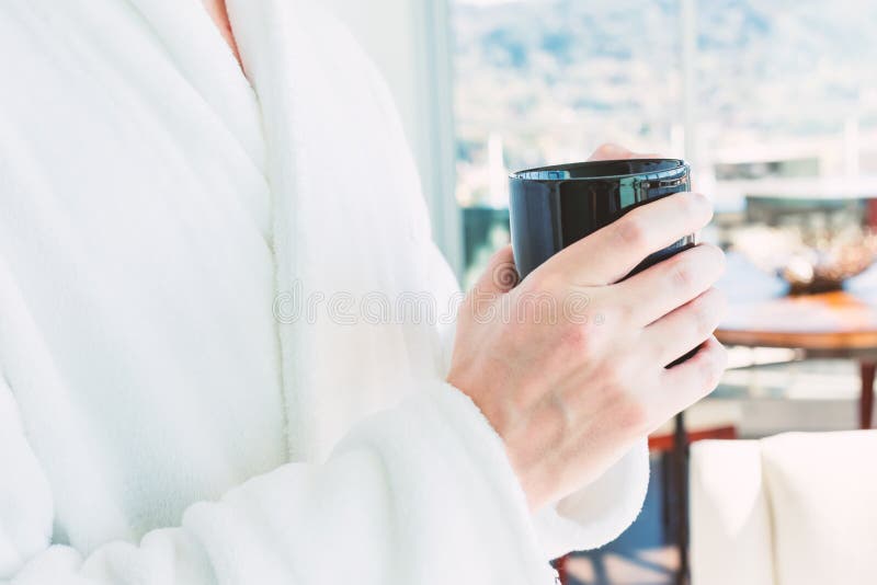 Man in a Bathrobe with a Cup of Coffee Stock Photo - Image of robe ...