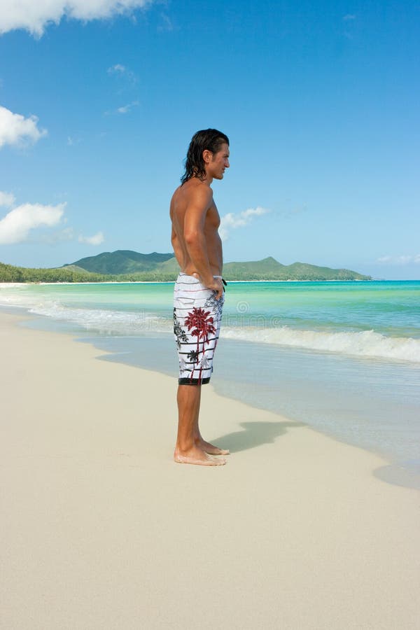 Man on beach stock photo. Image of shade, holidays, ocean - 12706644