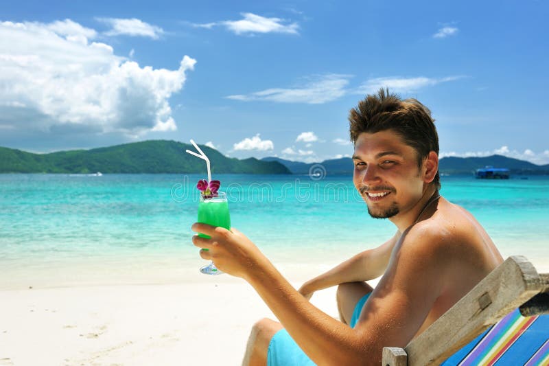 Man on a beach stock image. Image of ocean, water, cocktail - 13387115