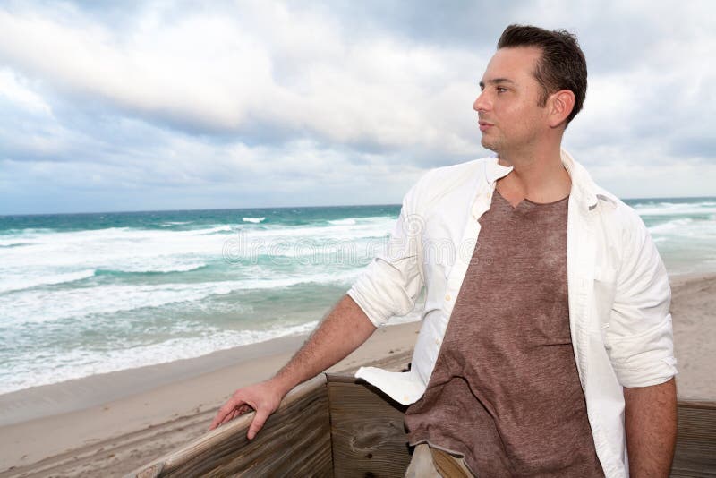 Man at the Beach stock photo. Image of ocean, outdoor - 23334290