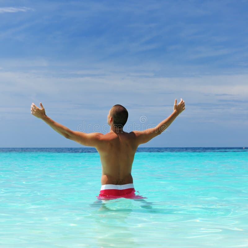 Man at beach stock image. Image of enjoyment, idyllic - 27744895