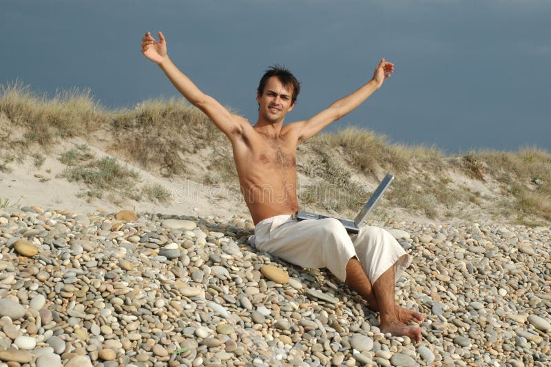 Man at the beach stock photo. Image of business, internet - 9422372