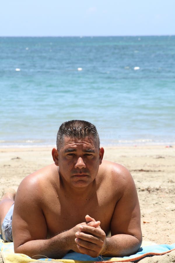 Man at the beach stock photo. Image of relaxing, vacation - 20210