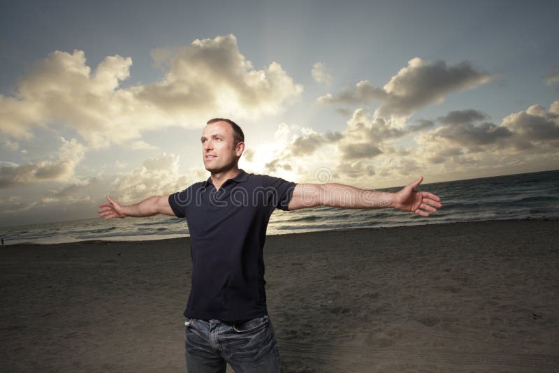 Man with arms extended stock photo. Image of praising - 1130324
