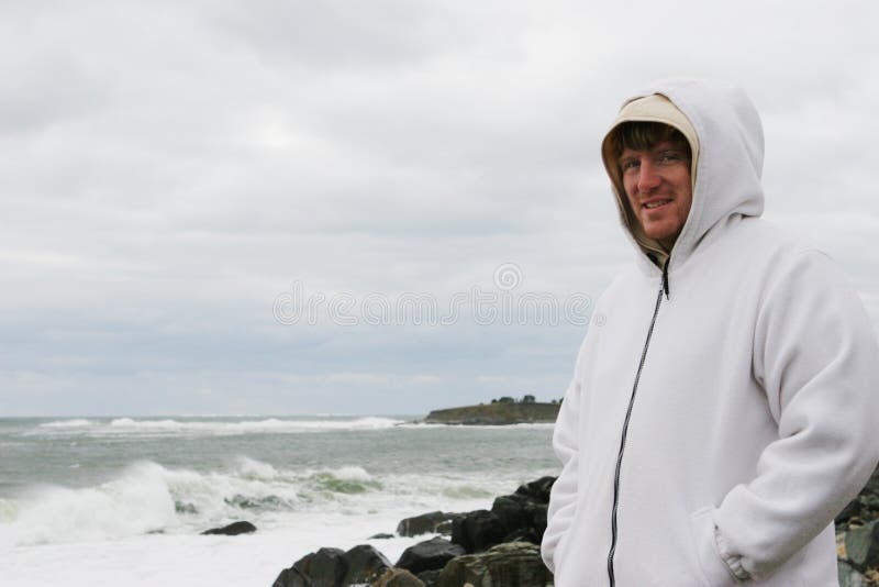 Man at the Beach on a Cold Day Stock Photo - Image of coastline, farm ...