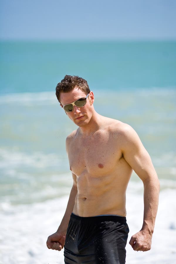 Man at the Beach with Shades Stock Photo - Image of beach, demure: 5136288