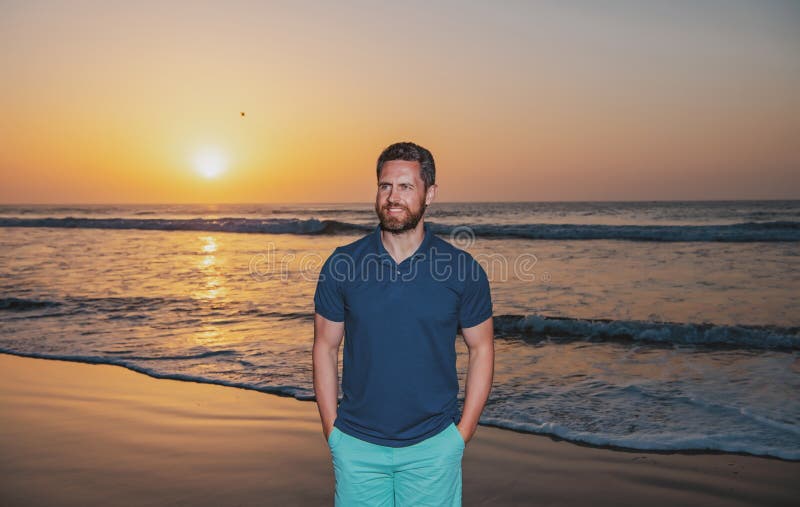 Man on the Beach on Sunset. Holiday Summer Vacation. Stock Image ...