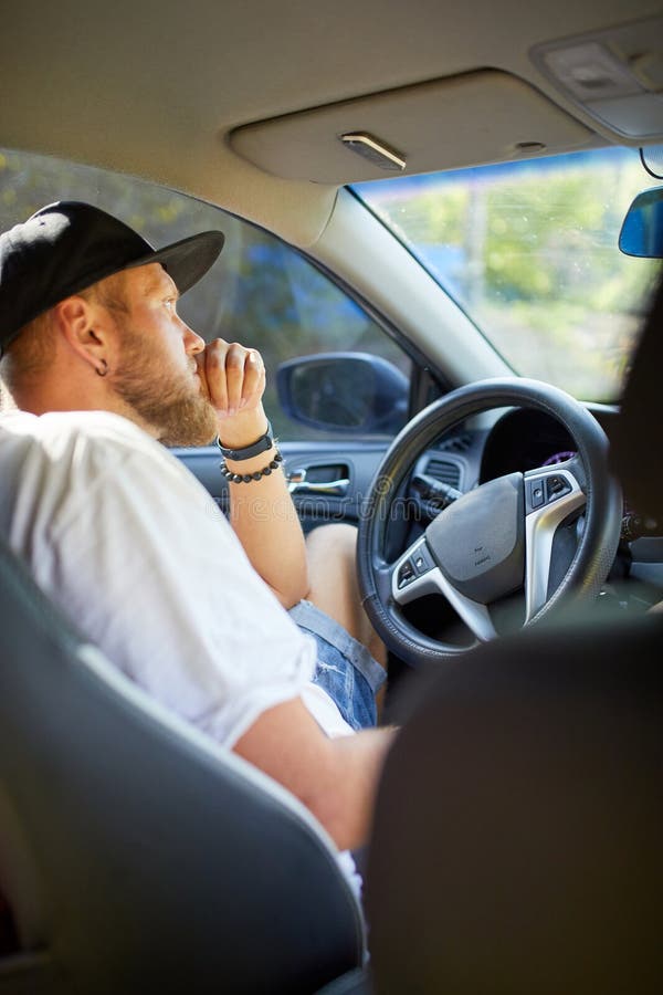 Man with Beard is Driving Car, Driver Stuck in Traffic Jam Stock Photo ...
