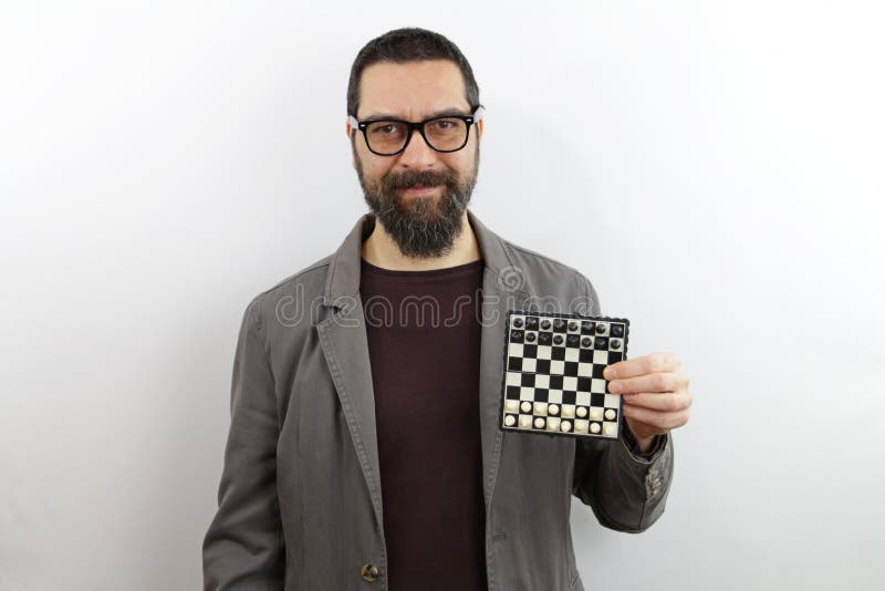 Man Holding Chess Go Game Board Looking Positive Standing and Smiling ...