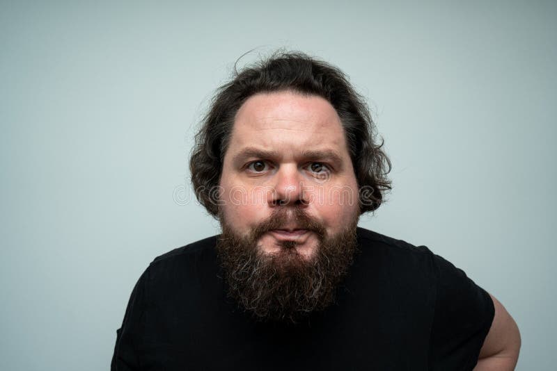 Man with a Beard Looks Skeptically at the Camera Stock Image - Image of ...